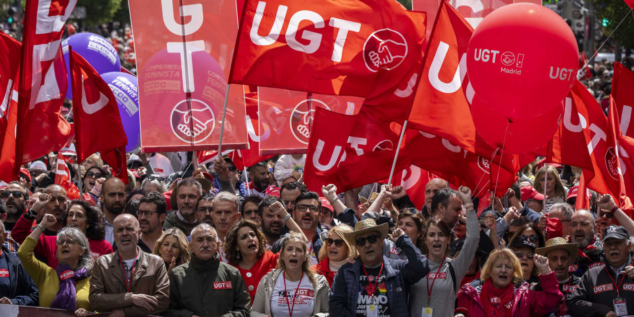 Workers and activists around the world hold May Day rallies urging ...