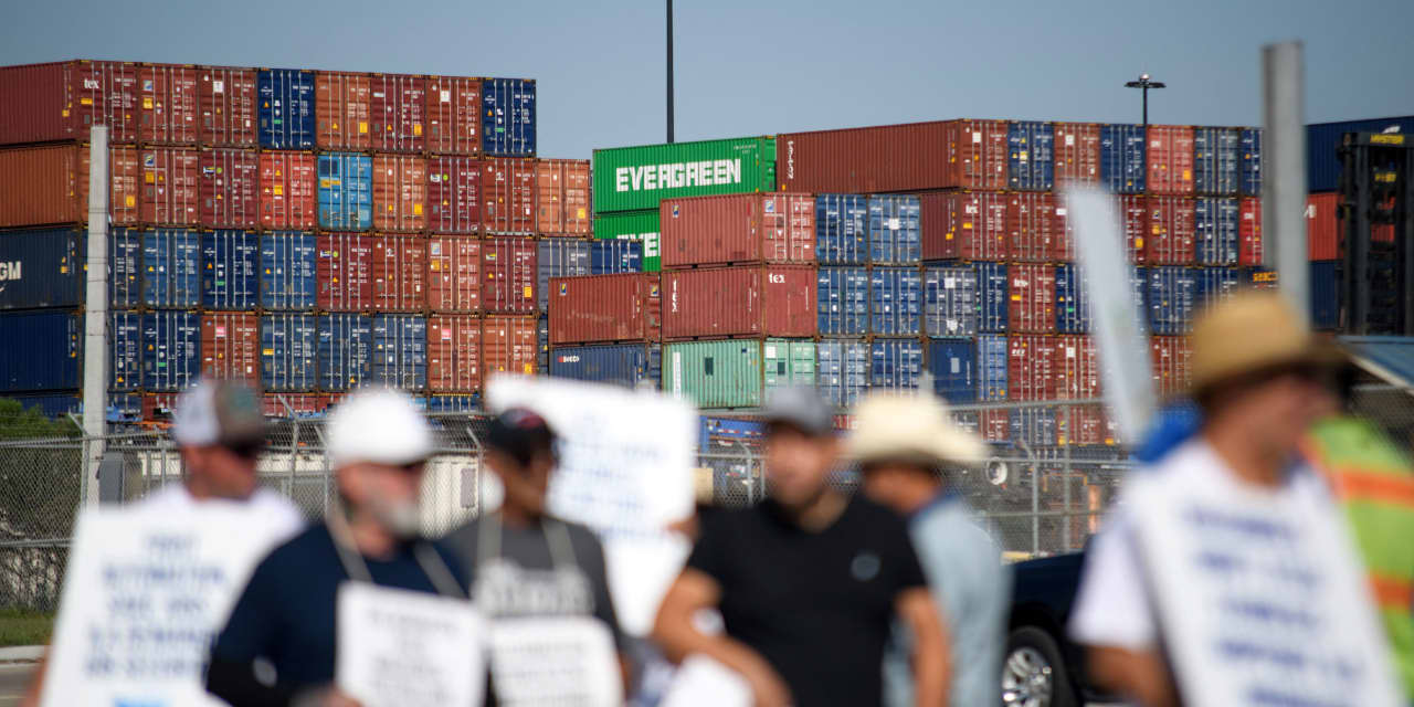 Dockworkers union agrees to suspend port strike until Jan. 15 after ...