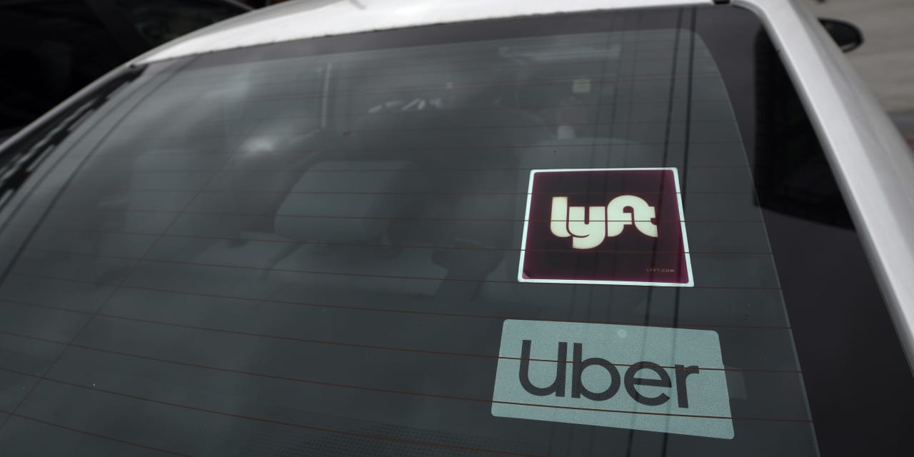 Opinion: Uber and Lyft are staging a ridiculous race for fake profits ...