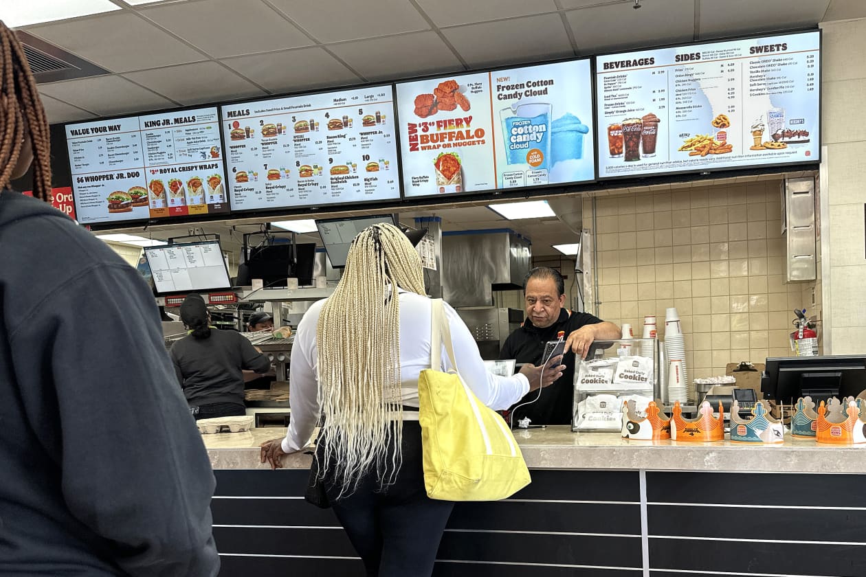 The Fed said it needs more low-inflation signs to cut interest rates ...