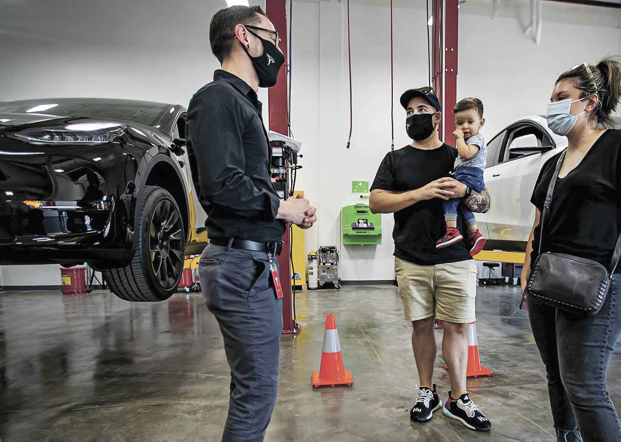 Tesla builds first store on tribal land, dodging state car laws ...