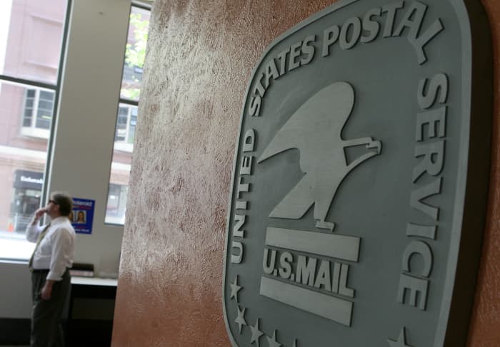 U.S. Postal Service is testing paycheck-cashing service at some post ...