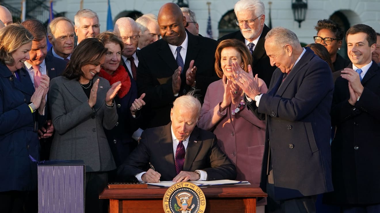 Biden signs bipartisan infrastructure bill into law, authorizing big ...