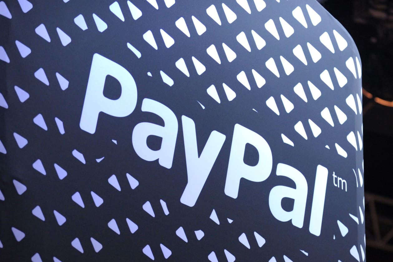 PayPal stock sinks after earnings as inflation, spending pressures ...