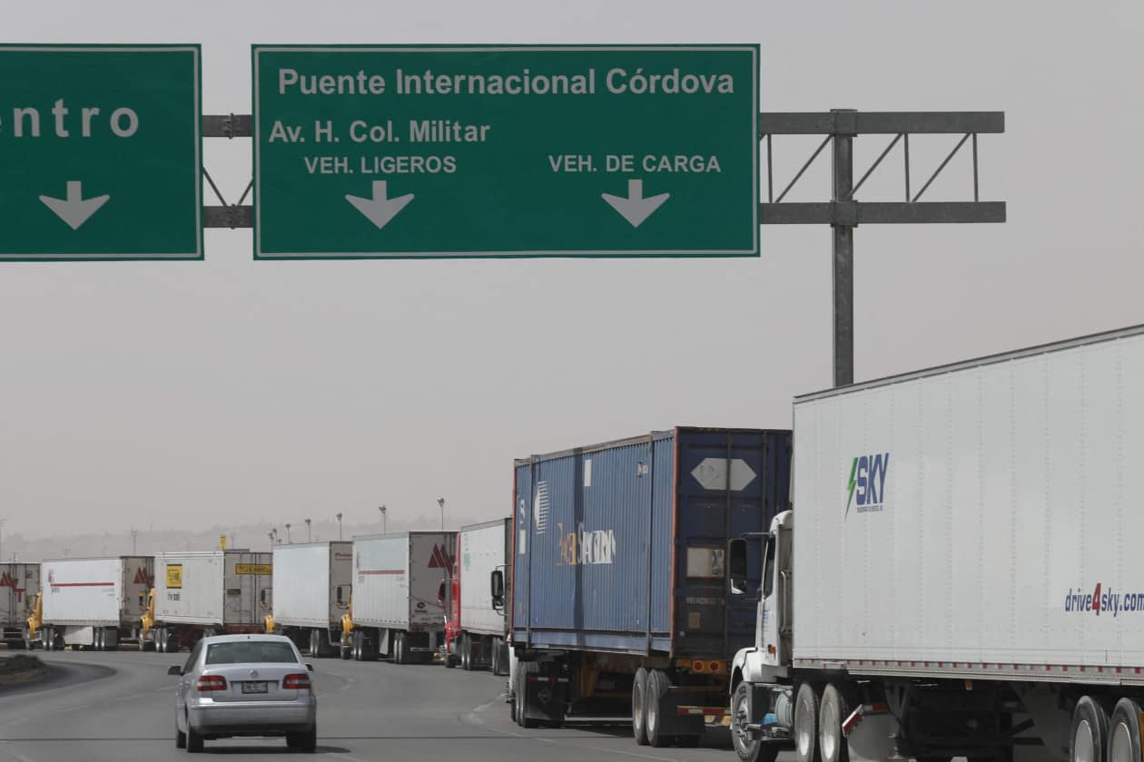 Mexicans Crossing Freeway Sign