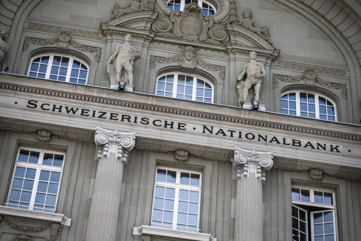 Swiss central bank becomes first major bank to cut rates as Fed and ECB ...