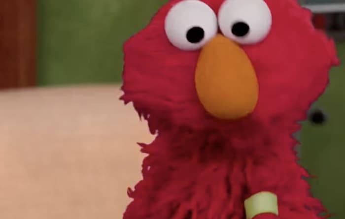 Elmo gets the COVID vaccine, and says ‘there was a little pinch, but it ...