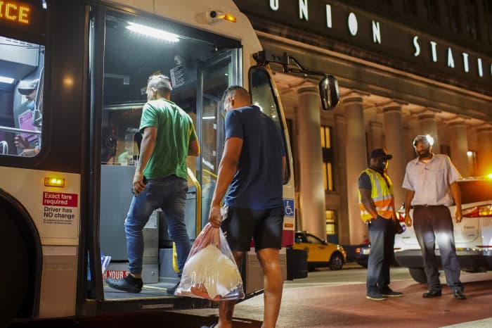 Texas Gov. Abbott buses 75 migrants to Chicago. Illinois Gov. Pritzker ...