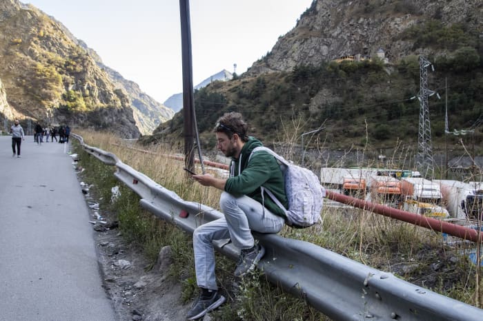 Russia opens border draft offices as exodus continues in response to ...