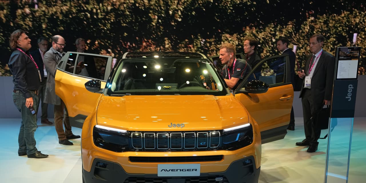 Electric vehicles take center stage at pared-back Paris auto show ...