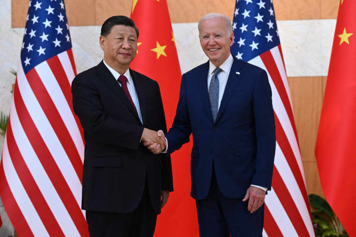 Biden, Xi shake hands as they meet for first since U.S. president's ...