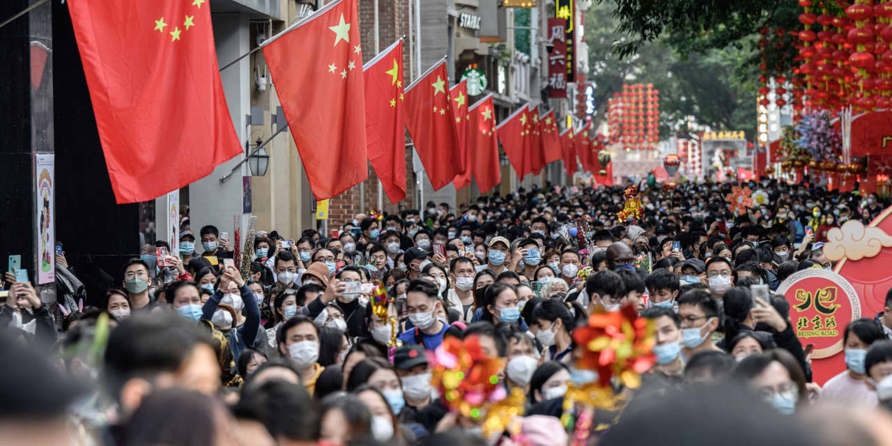 China rings in Lunar New Year with few COVID restrictions in biggest ...