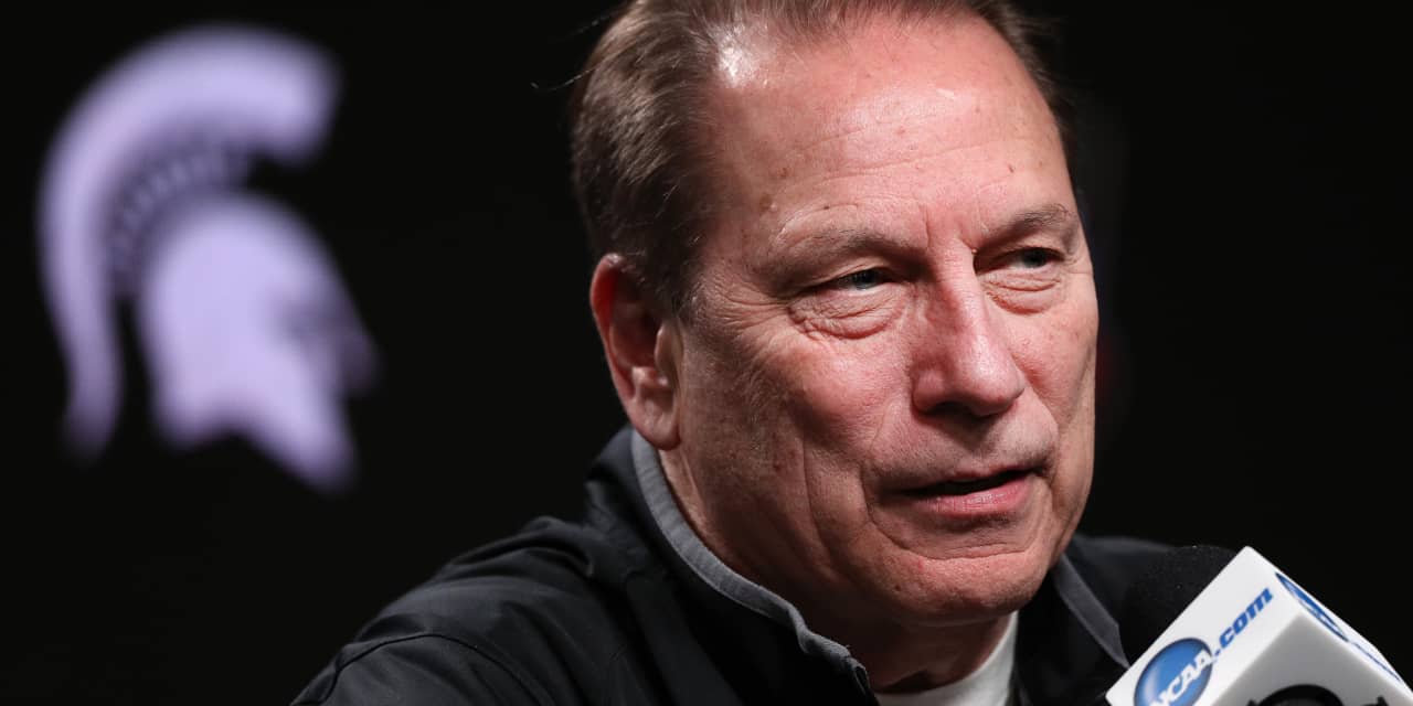 Michigan State basketball coach Tom Izzo speaks at vigil after mass ...