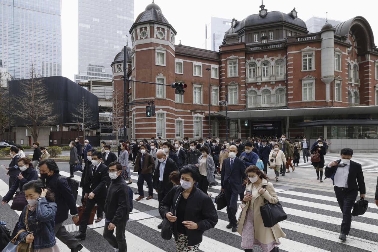 After 3 years, Japan lifts COVID mask rules — but most people are still ...