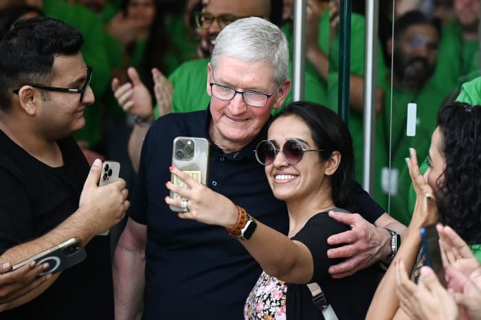 Apple opens flagship store in India as Tim Cook greeted by fans and an ...