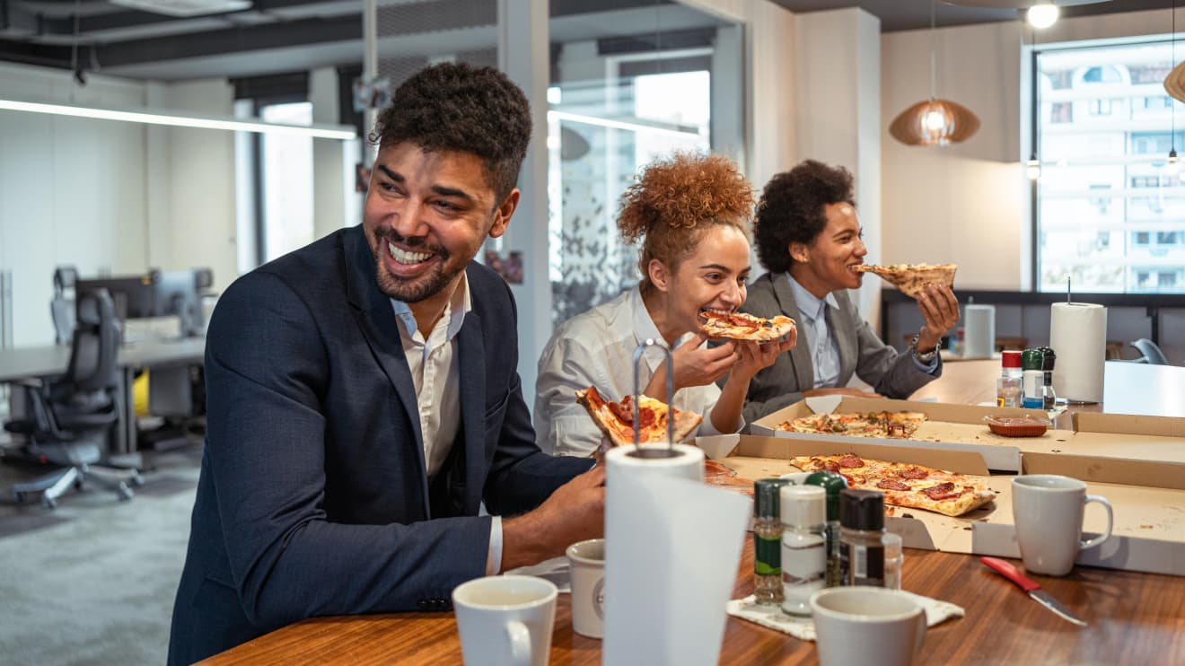 The great corporate buffet: Why companies will be giving out free pizza ...