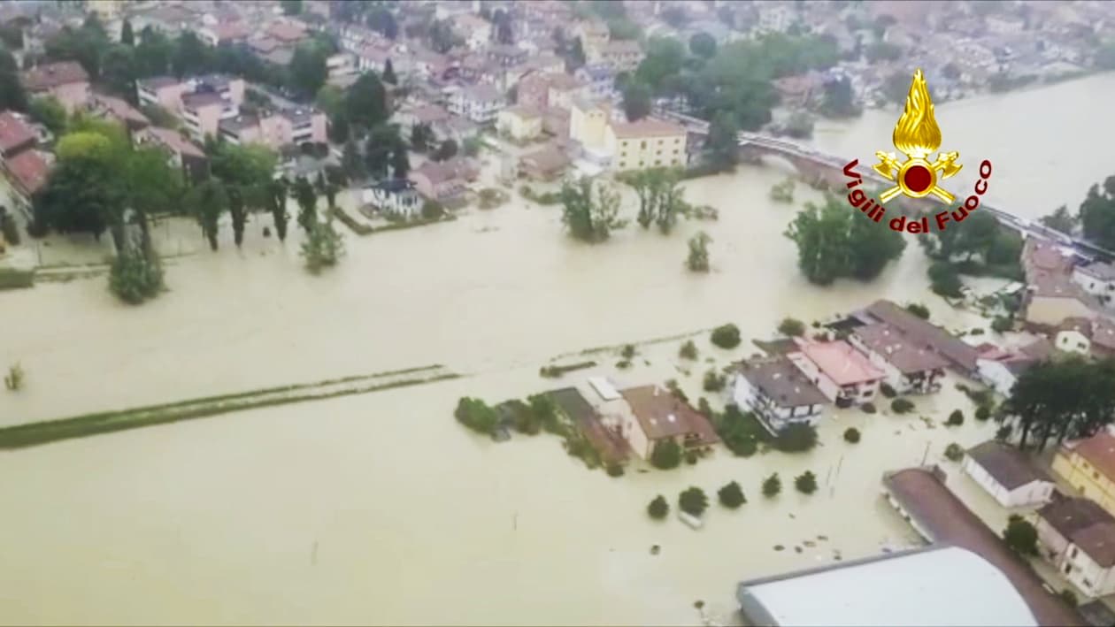 Five dead as heavy rains in northern Italy burst riverbanks, flood ...