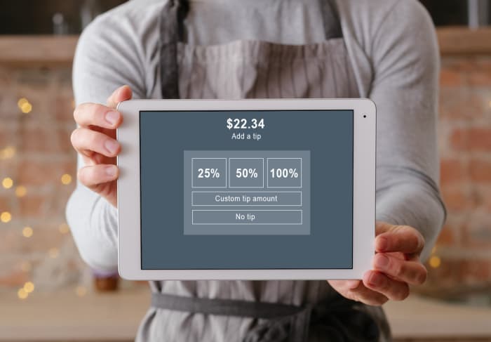 Here's how much to tip everyone — and a list of people you should never ...