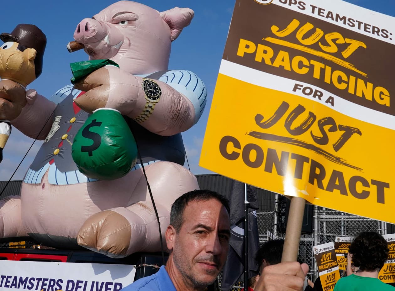 UPS, Teamsters reach tentative deal, averting threat of a strike ...