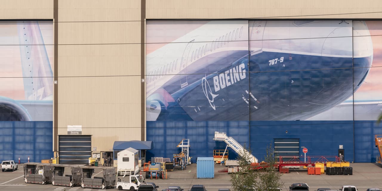Boeing to lay off thousands of workers, warns of quarterly loss and ...