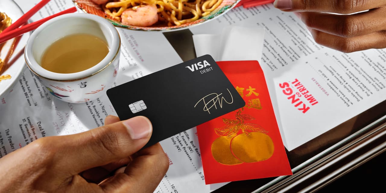 Fed proposes cut to debit card fees charged by banks but throws in a ...