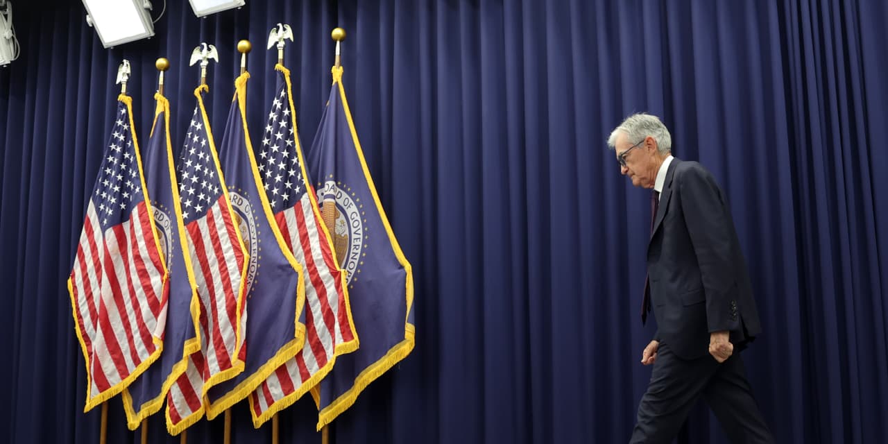 Fed minutes reveal discussion of a possible rate hike if inflation ...